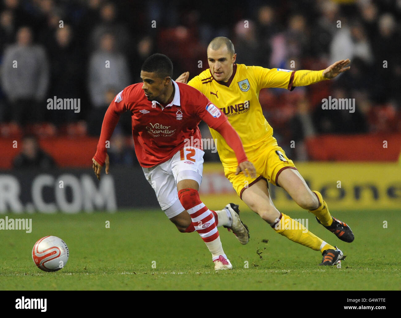 Nottingham Forest's Garath McCleary (left) and Burnley's Dean Marney ...