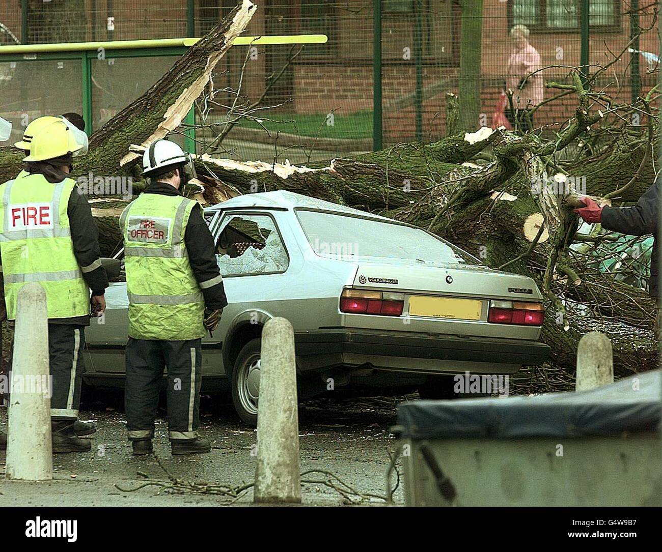 Firemen at the scene of an accident on the A435 Alcester Road South in ...