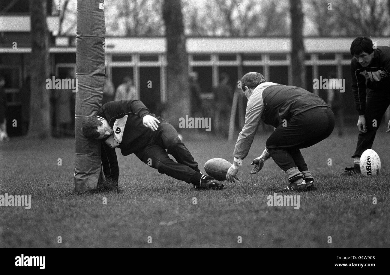 Goalpost leaner Colin Deans catches the ball thrown to him by Ian ...
