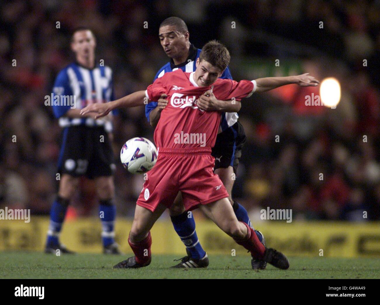Sheffield Wednesday's Des Walker gets to grips with Liverpool's Michael ...