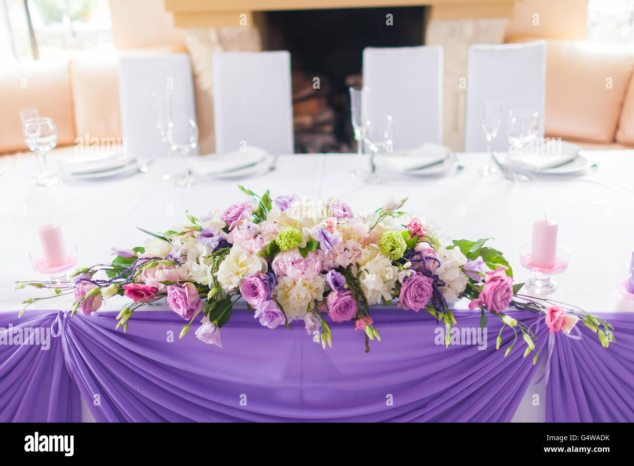 Tables decorated with flowers Stock Photo - Alamy