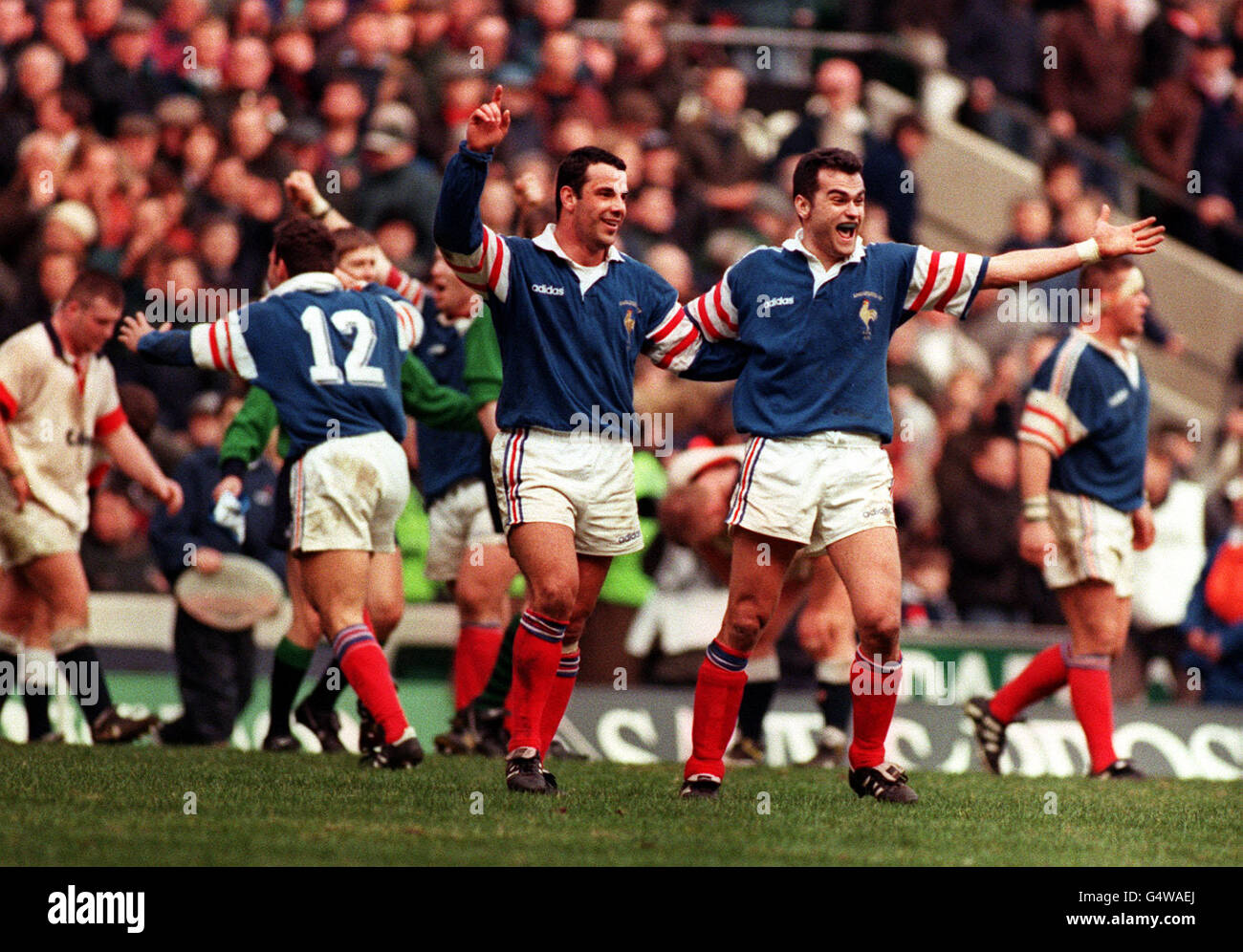 French rugby union players Christopher Lamaison (centre) and Alain ...