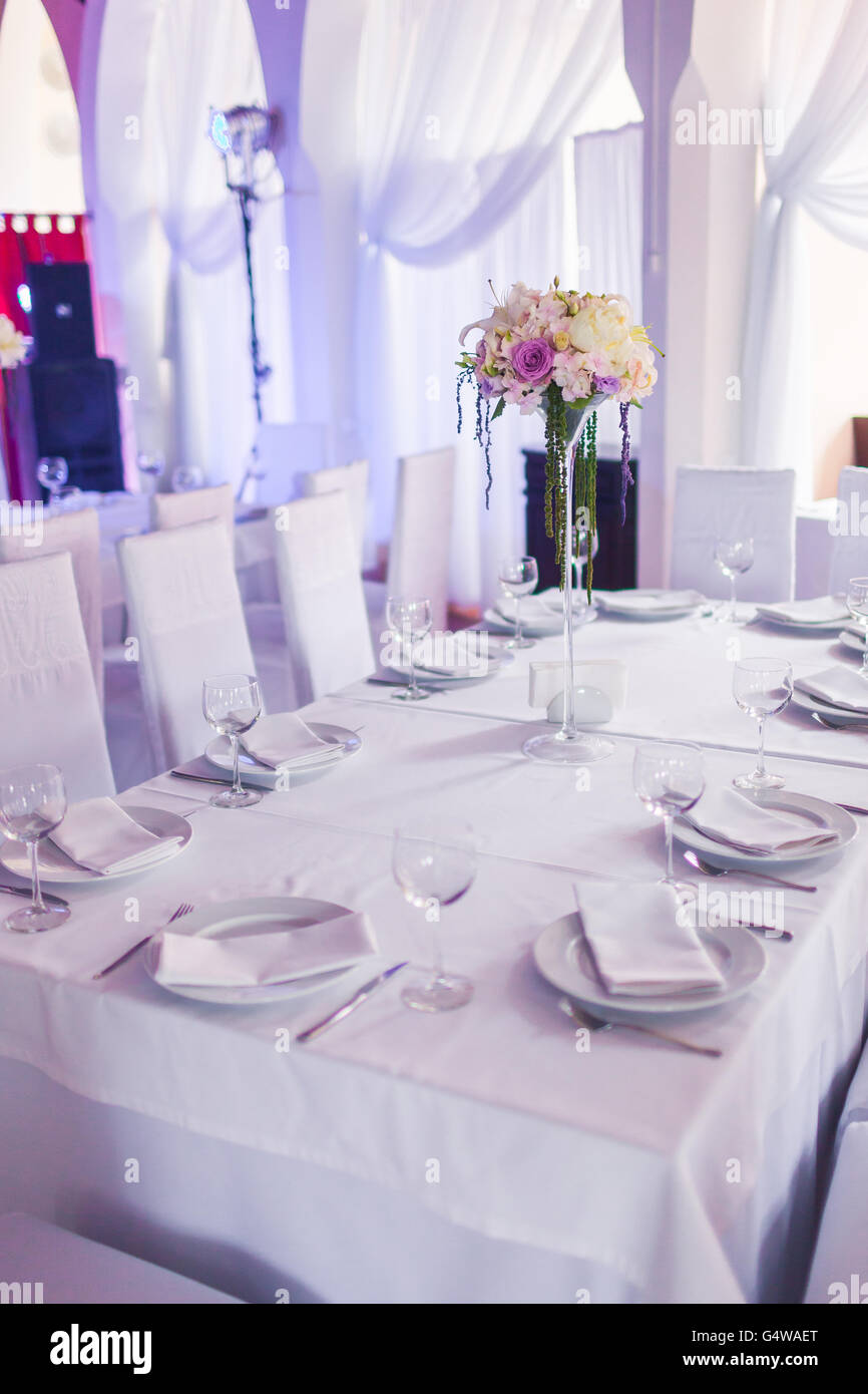 Tables decorated with flowers Stock Photo - Alamy