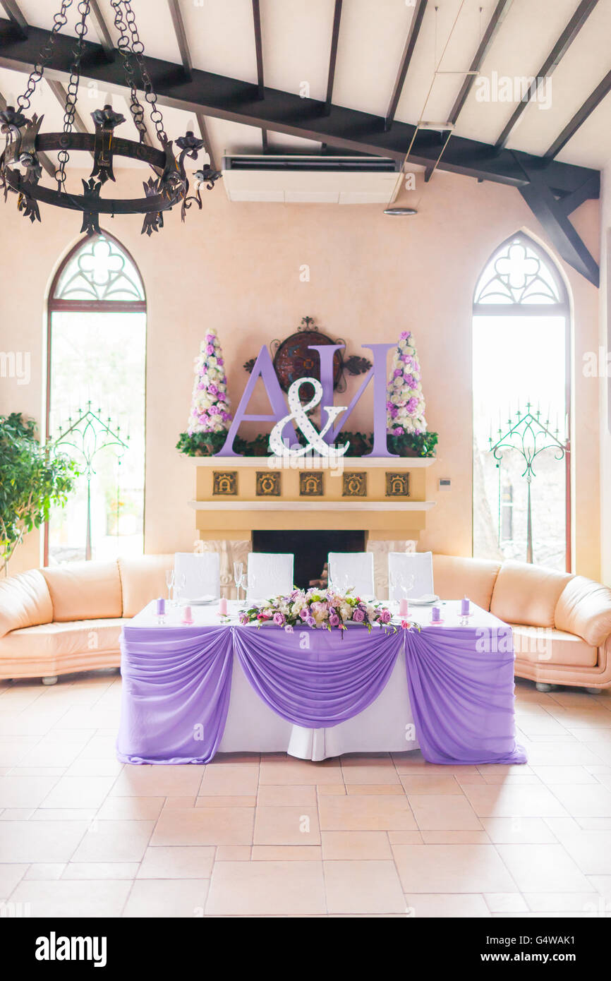 Bride and groom's table decorated with flowers Stock Photo - Alamy