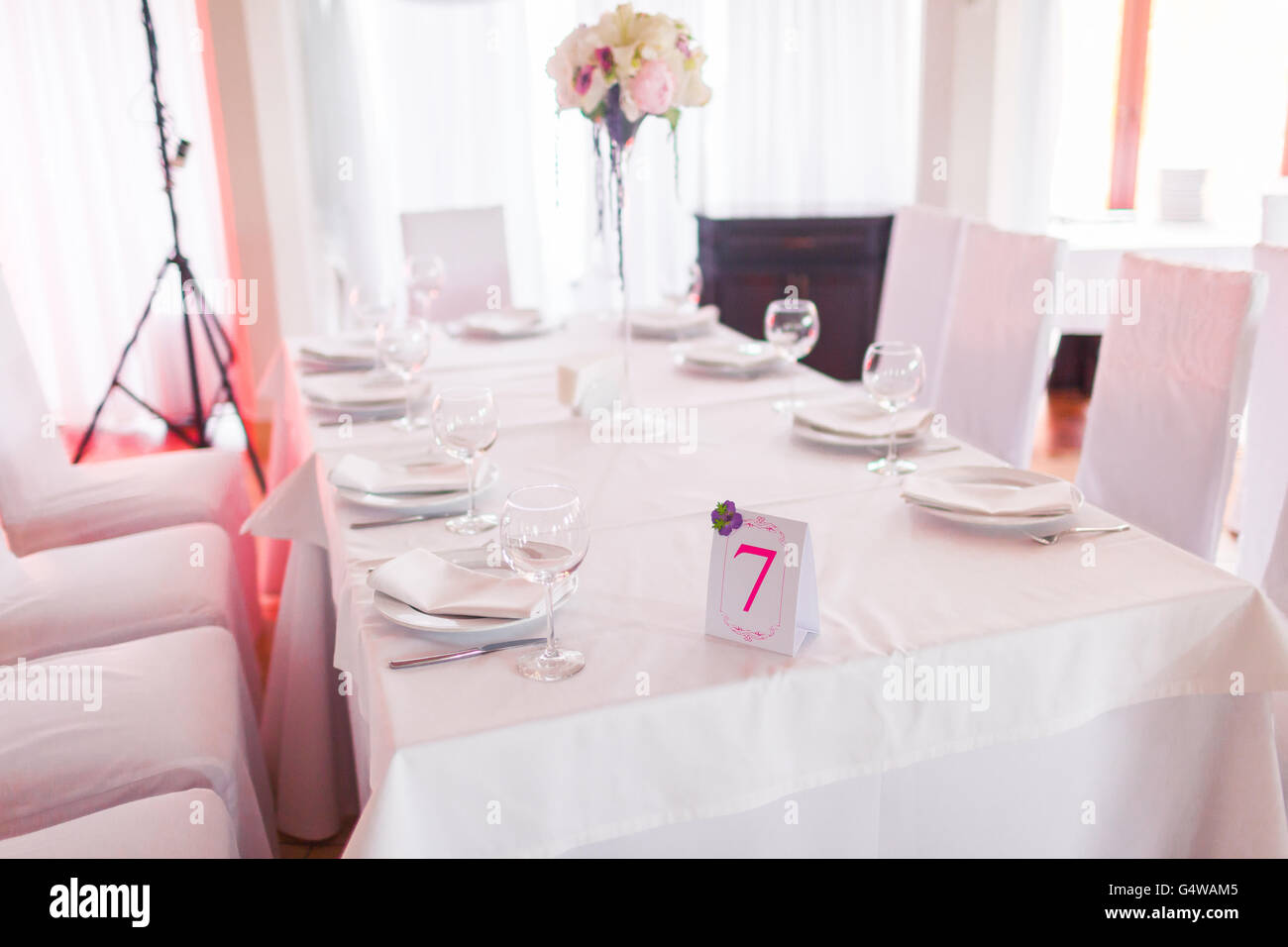 Tables decorated with flowers Stock Photo - Alamy