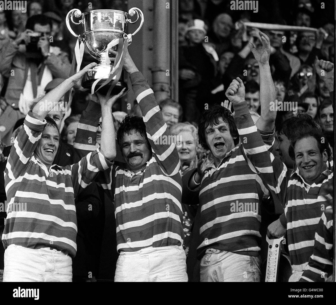Left-right: captain Peter Wheeler and Robin Cowling holding aloft the ...