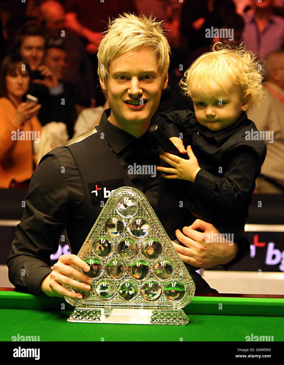 Neil Robertson celebrates winning the final of The Masters 2012 with ...