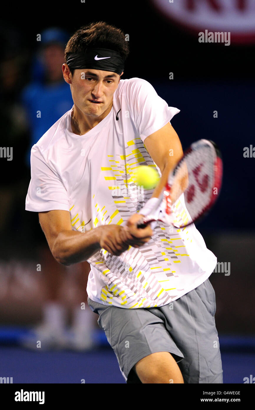 Australia's Bernard Tomic in action against Ukraine's Alexander ...