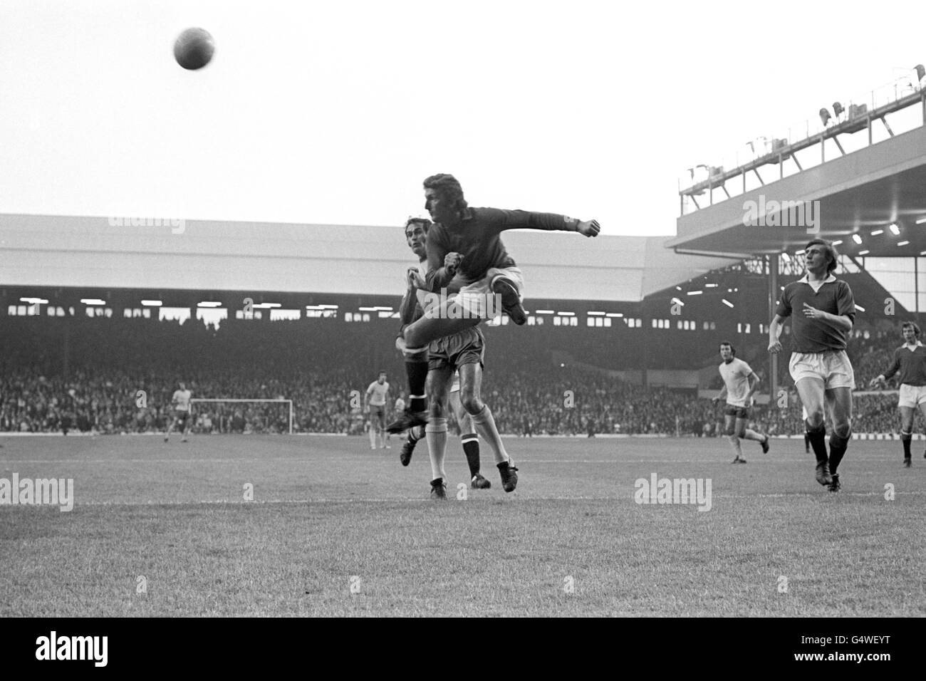 Manchester United goalkeeper Alex Stepney clears the ball away from ...