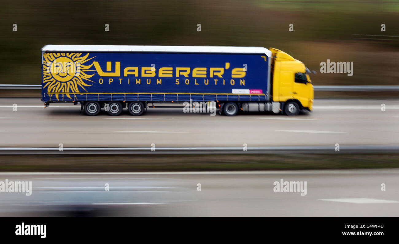 A foreign registered lorry passes through Kent on the M20 motorway as ...