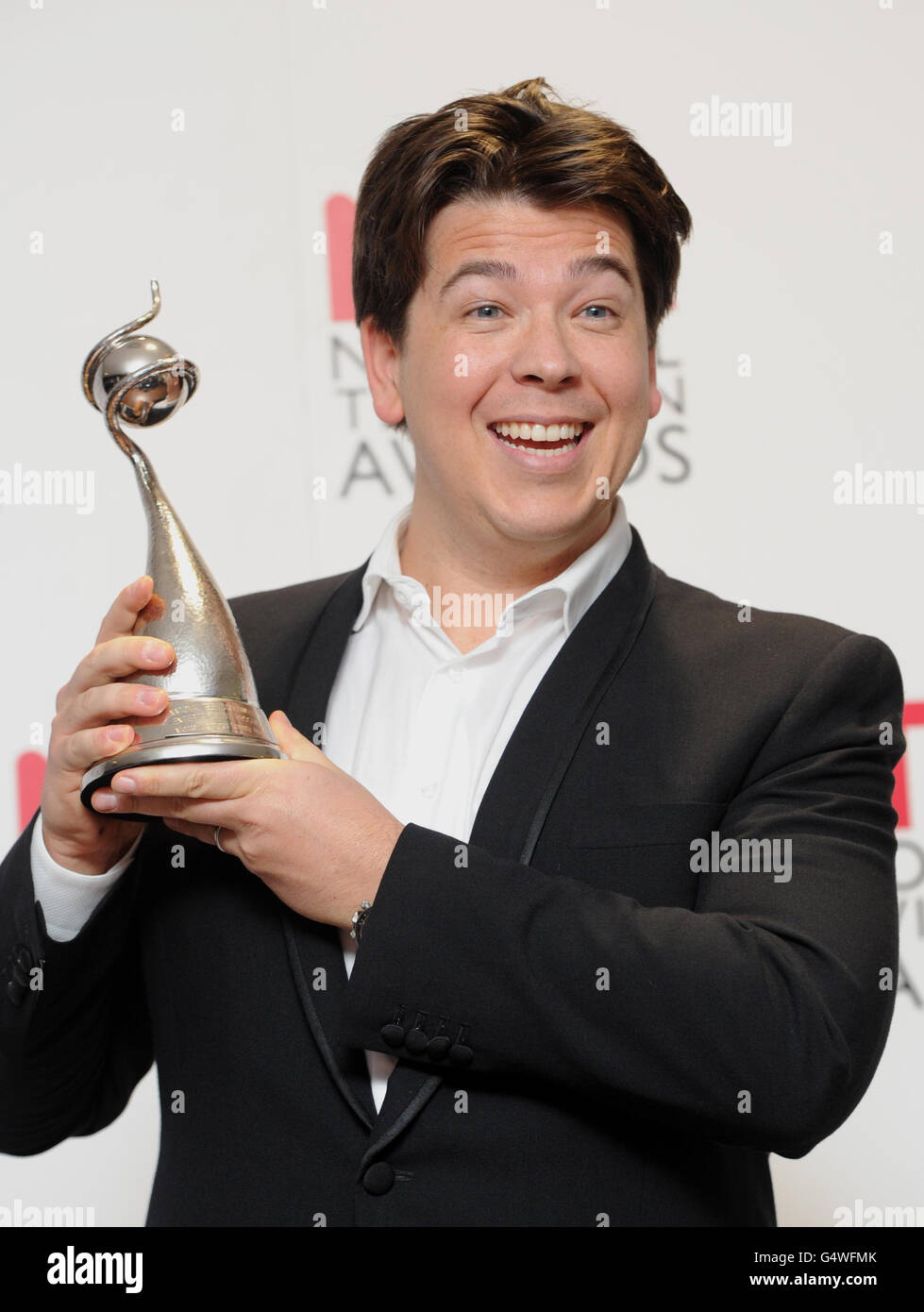 Michael McIntyre with his award for Best Entertainment Programme ...