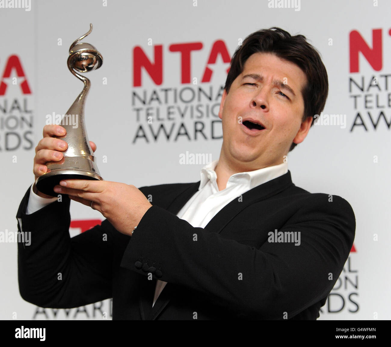 Michael McIntyre with his award for Best Entertainment Programme ...