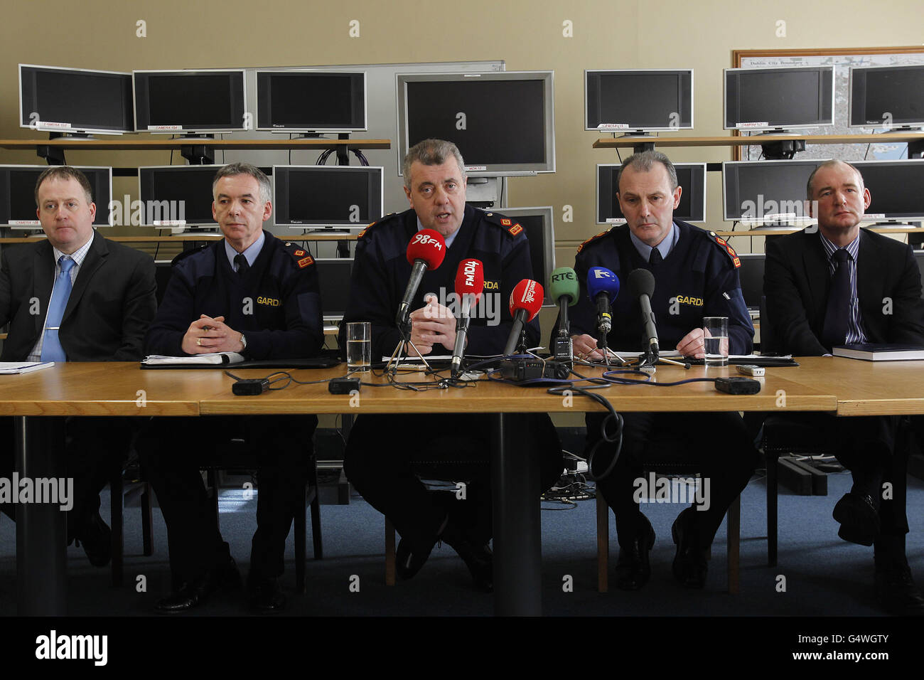 Superintendent John Gilligan (centre) with (left - right) Detective ...
