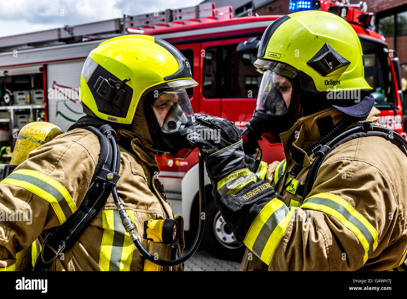 Fire fighters, during an exercise, with Respiratory protective ...
