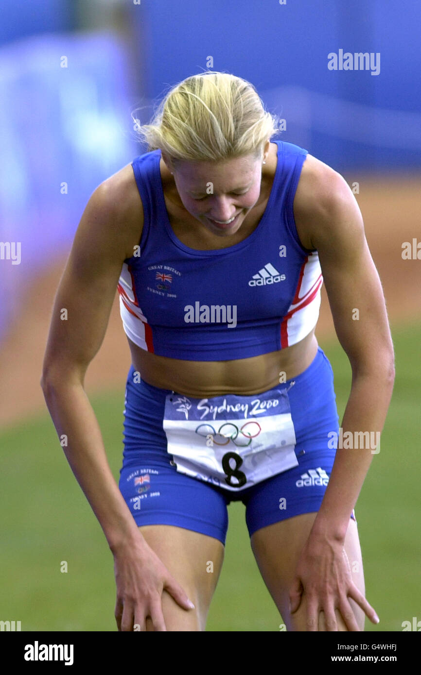 Great Britain's Stephanie Cook is overcome with emotion as she crosses ...