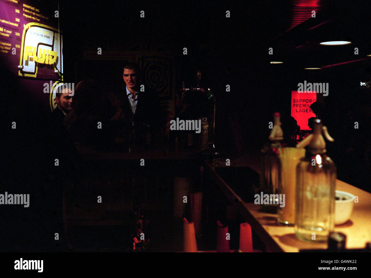 Customers socialising and enjoying a drink in Fluid bar, 40 ...