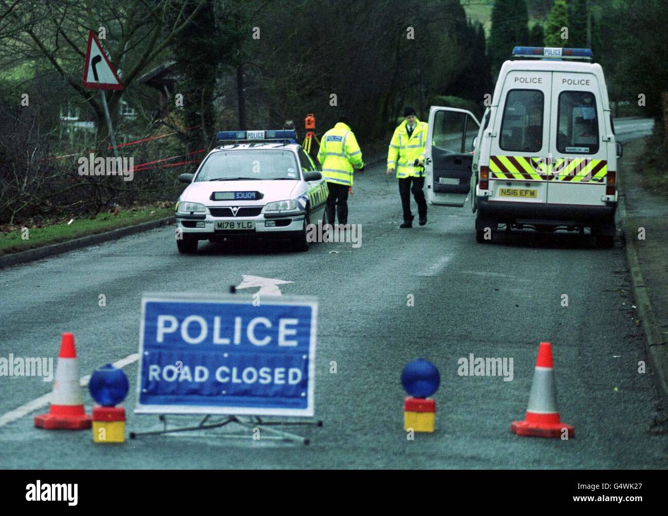 Police officers at the scene of a road accident, outside Macclesfield ...