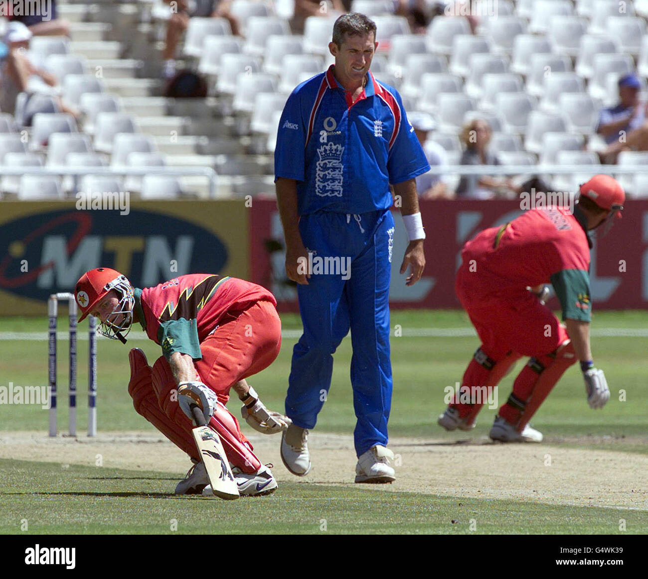 Cricket Caddick & batsman Stock Photo - Alamy