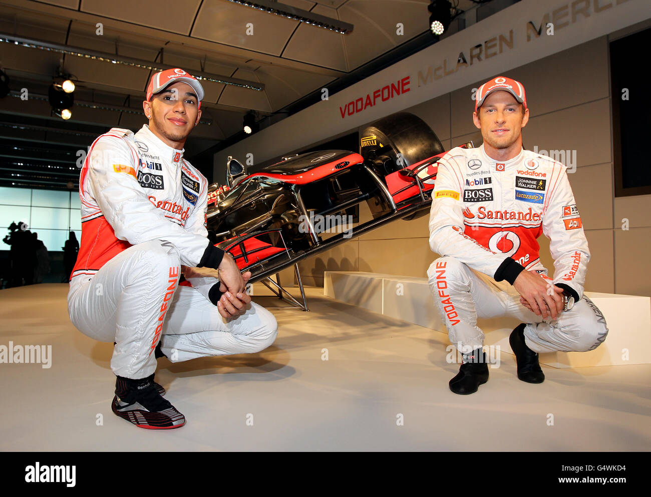 Drivers Lewis Hamilton and Jenson Button (right) pose for a picture ...