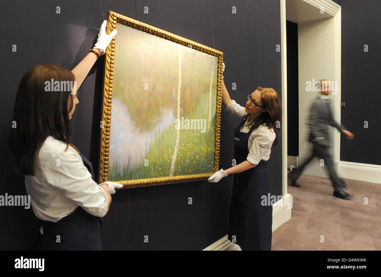 Auction House Workers Laura Thatcher (left) and Selina Fischer handle ...