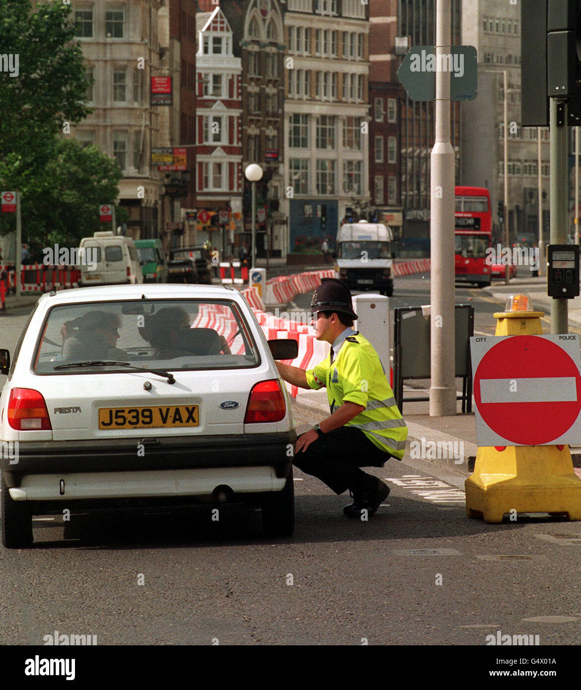 Police checking vehicles at anti-terrorist roadblocks set up in the ...