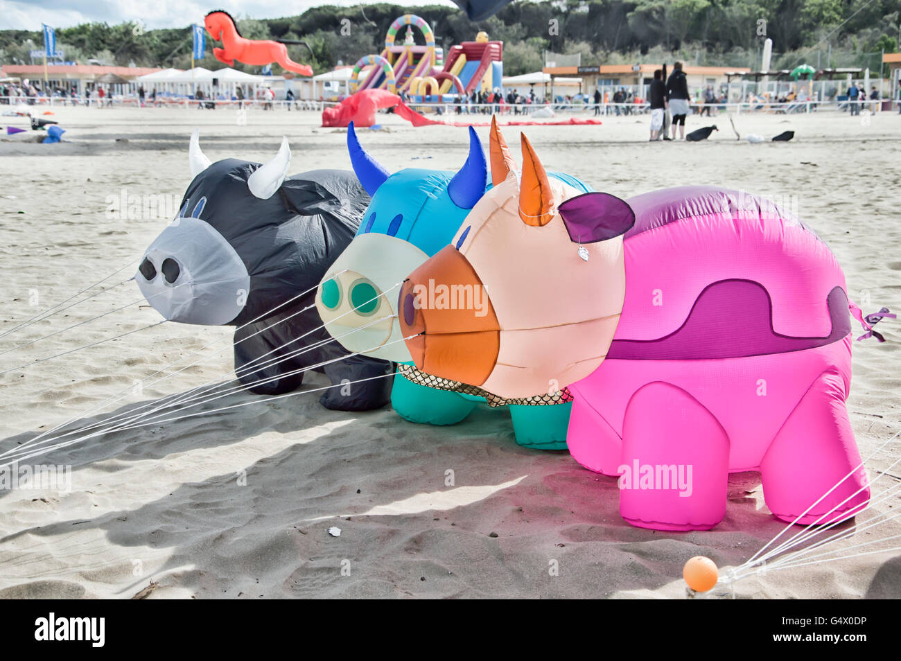 Inflatable cows in a festival Stock Photo - Alamy