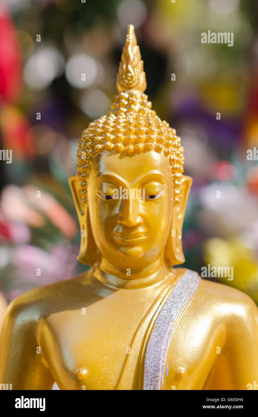 Closeup of golden buddha. Focus on eye Stock Photo - Alamy