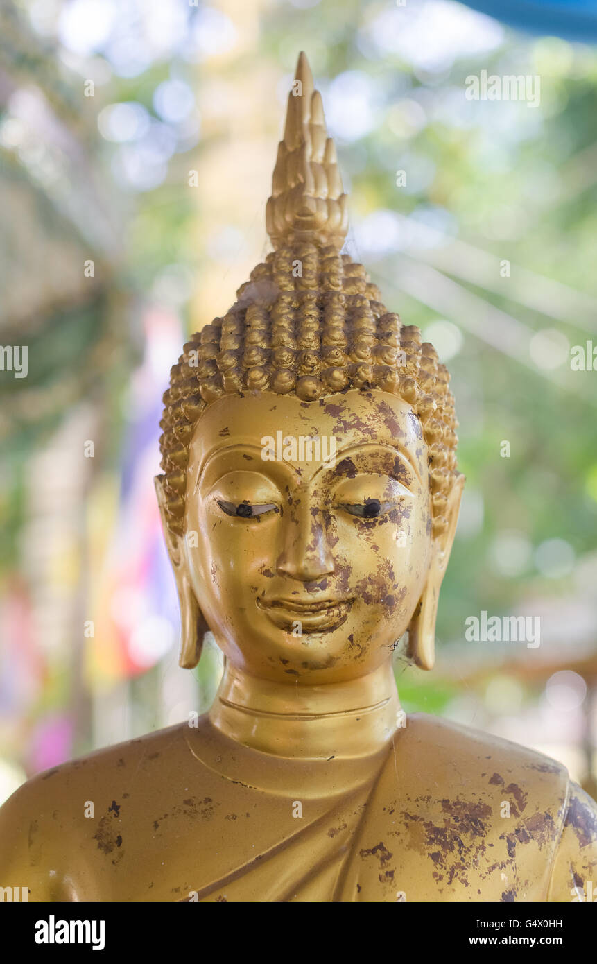 Closeup of golden buddha. Focus on eye Stock Photo - Alamy
