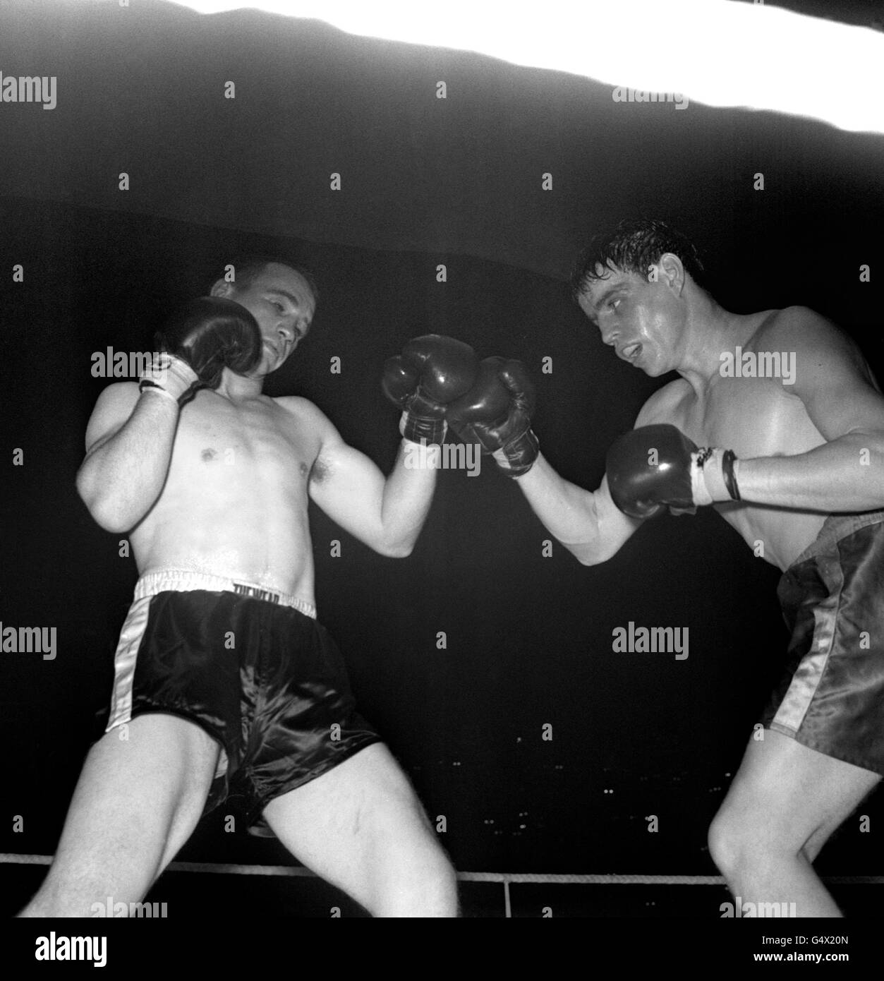 Former World Middleweight Champion Terry Downes, Great Britain, (r) in ...