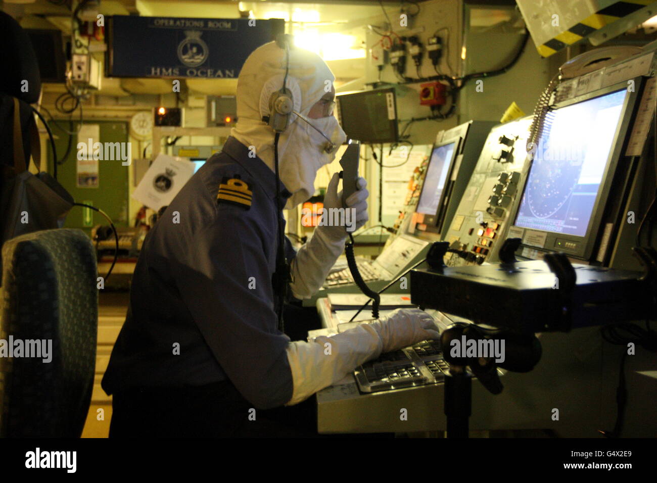 Royal Navy personnel practice in the operations room onboard HMS Ocean ...