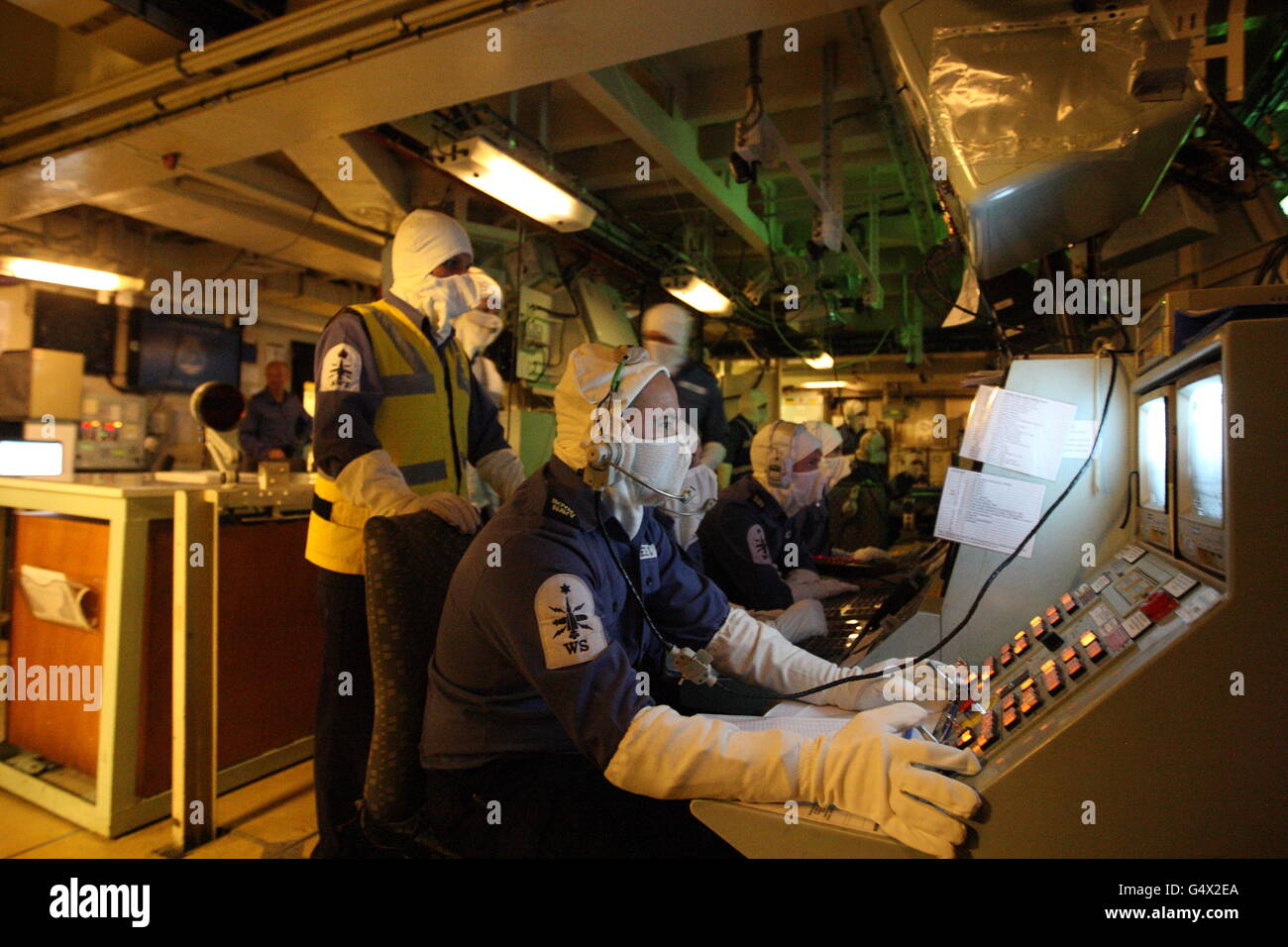 Royal Navy personnel practice in the operations room onboard HMS Ocean ...