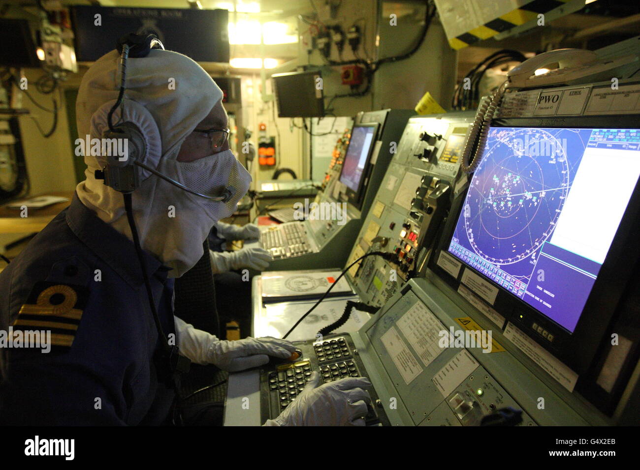Royal Navy personnel practice in the operations room onboard HMS Ocean ...