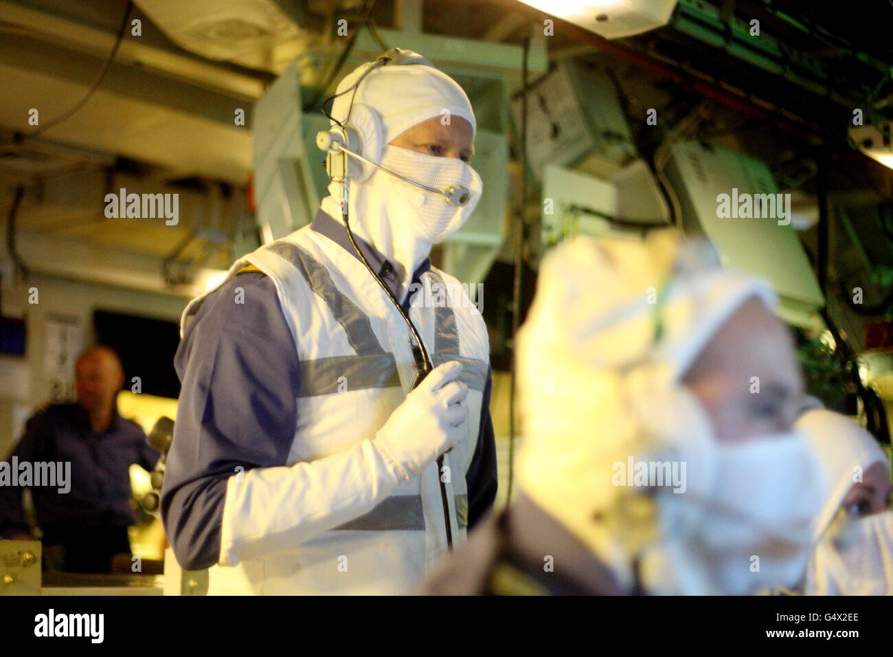 Royal Navy personnel practice in the operations room onboard HMS Ocean ...