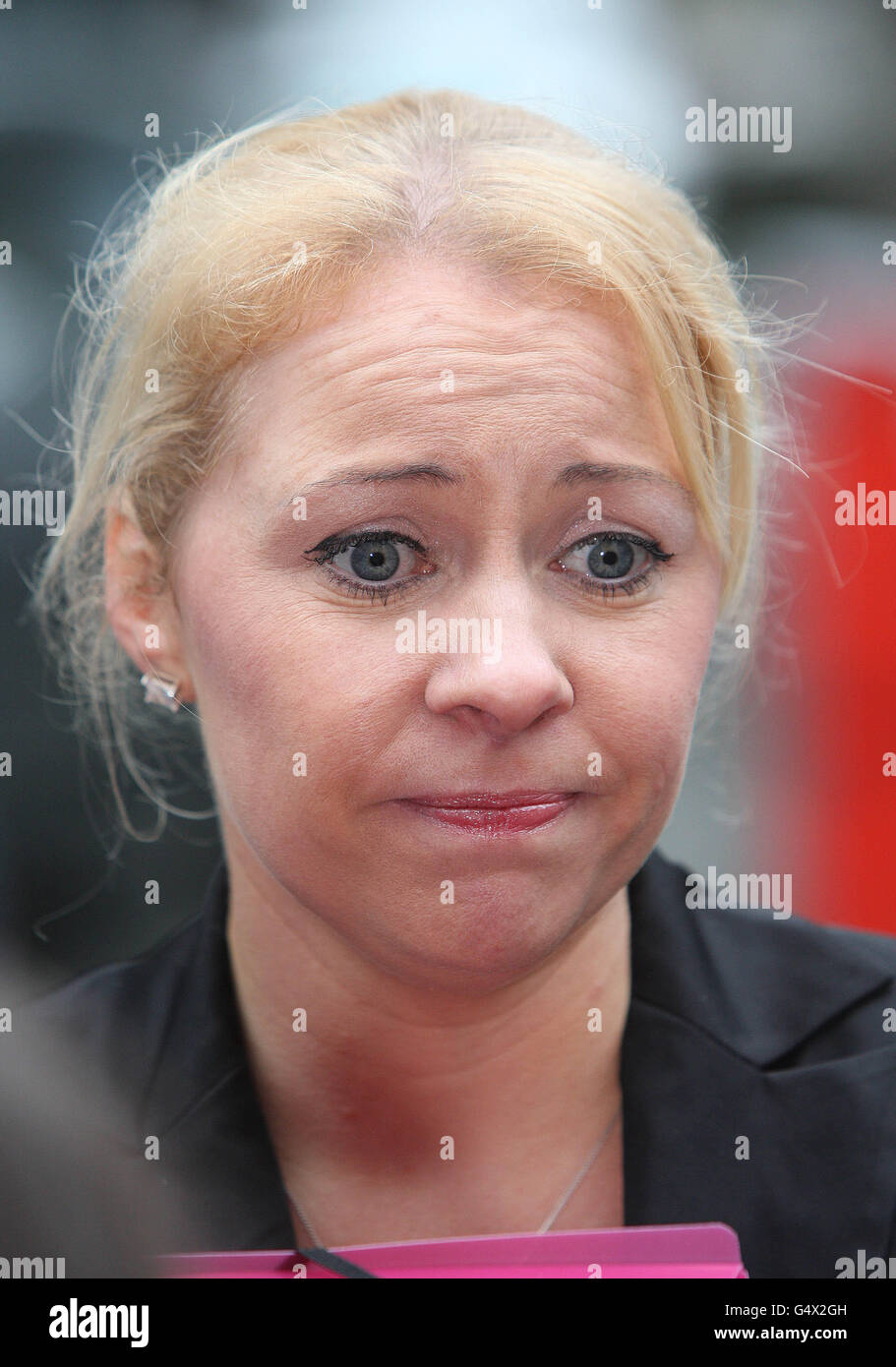 Lisa Fair reads a statement outside the Department of Heath after a ...