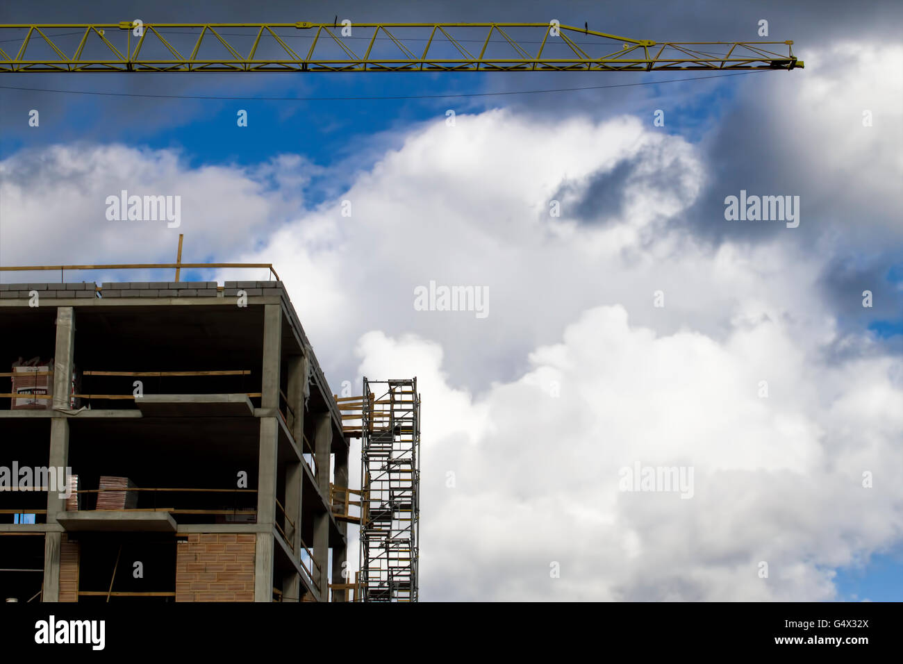 Crane and building construction site. Close up Stock Photo - Alamy