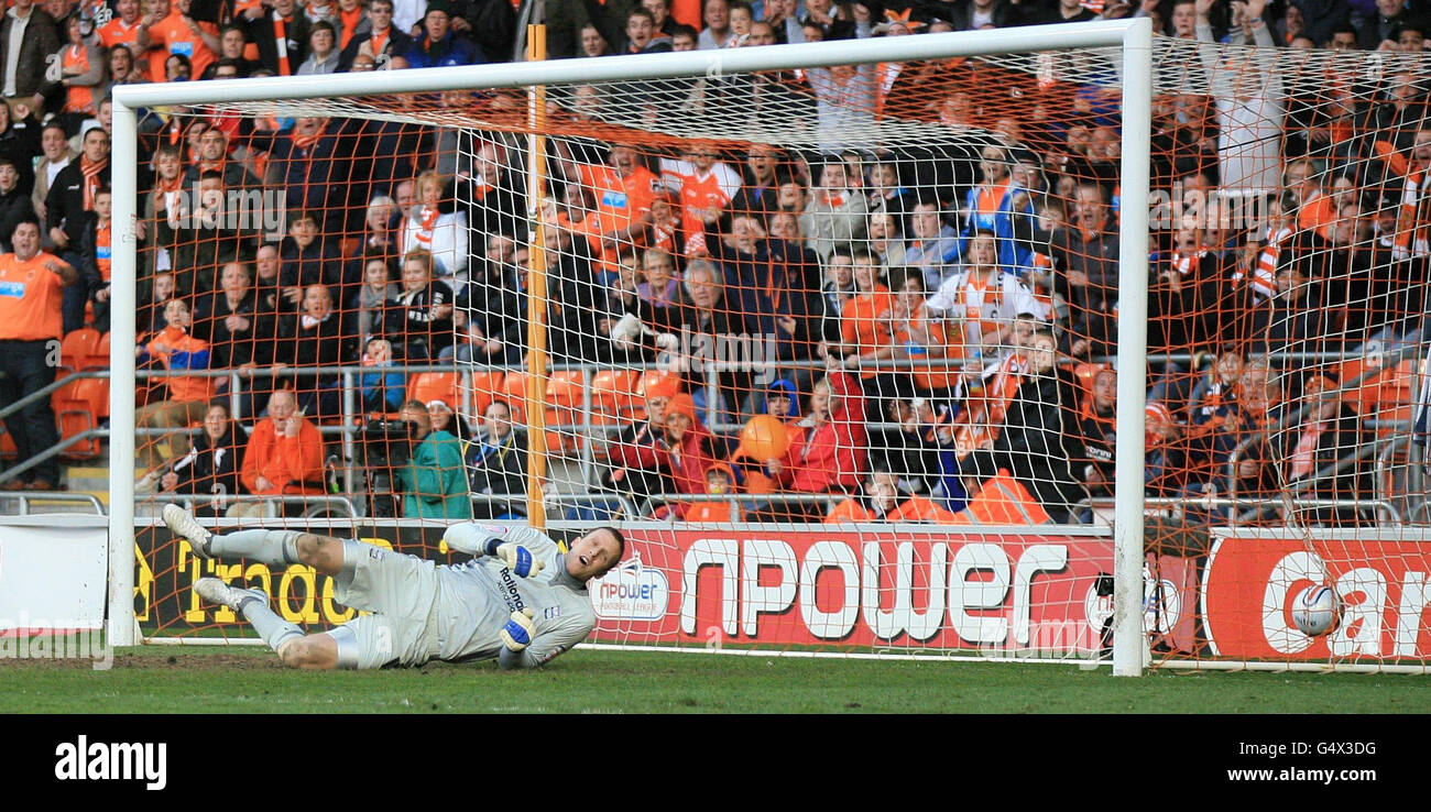 Birmingham's goalkeeper Colin Doyle sees Blackpool's Tom Ince's ...