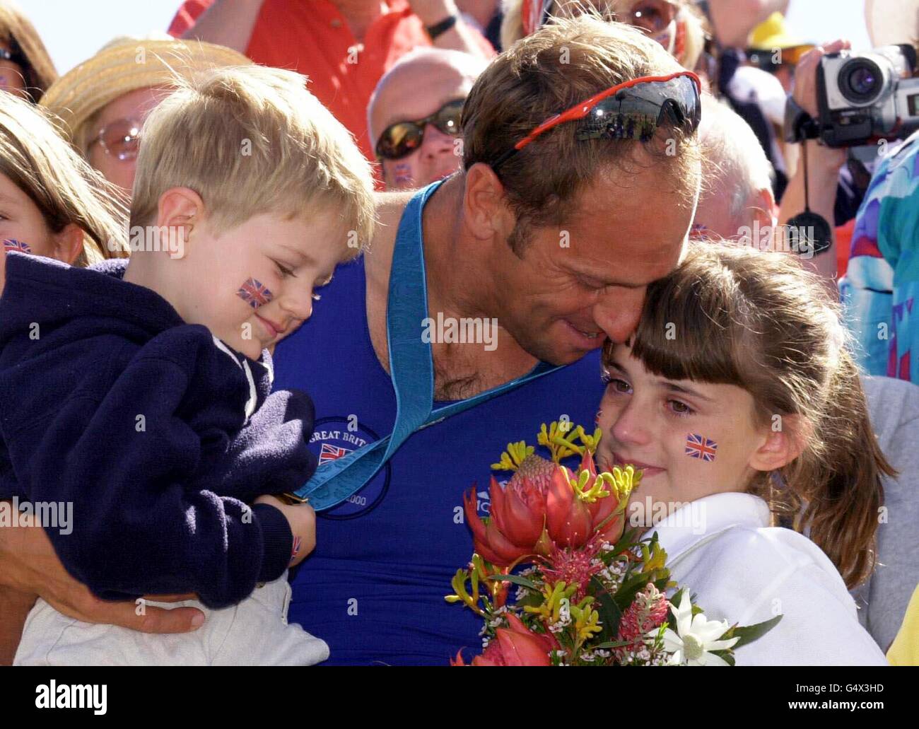 Great Britain rower Steve Redgrave celebrates with his children Zac and ...