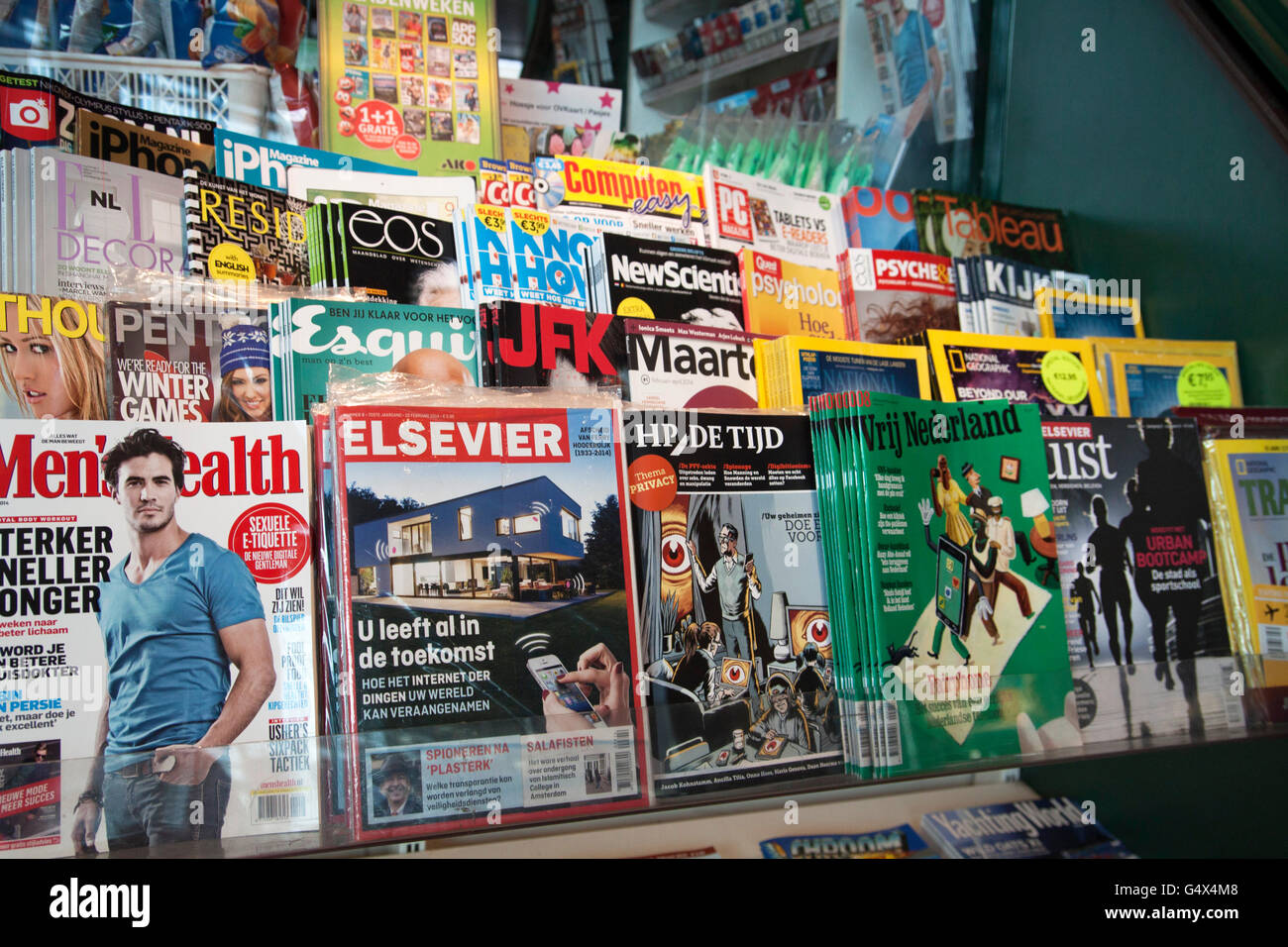 AMSTERDAM,HOLLAND - FEBRUARY 23, 2014: different colored magazines ...
