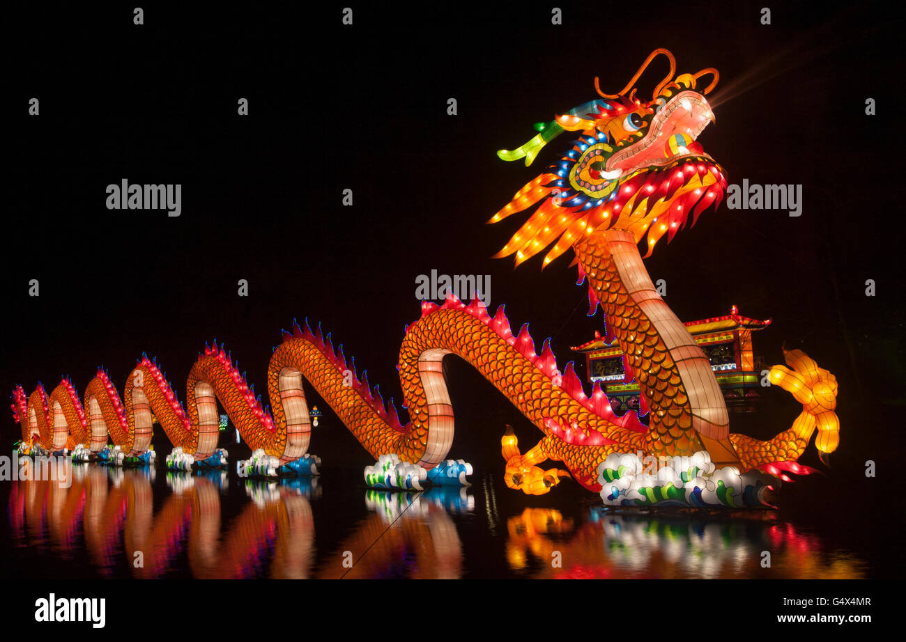 Night photo of an orange chinese art object during China Light Festival ...