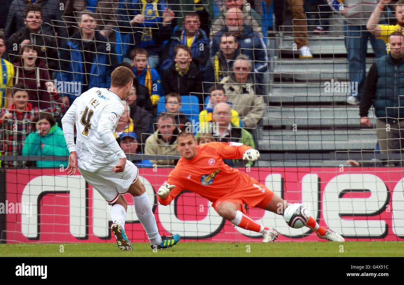 Hereford's Harry Pell scores their second goal from the penalty spot ...