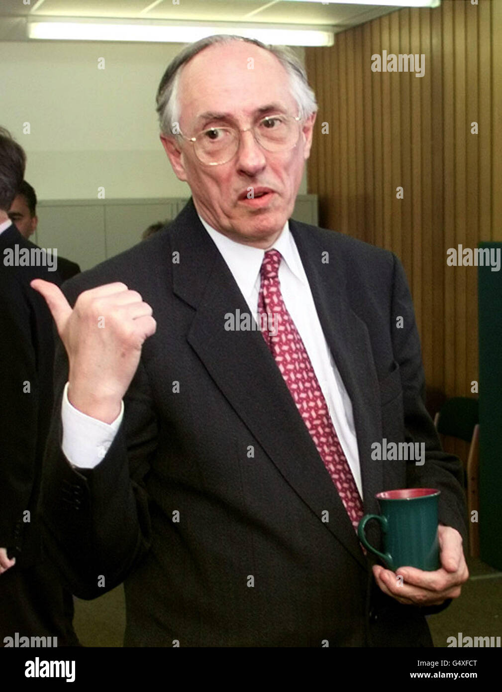 Scottish Secretary Donald Dewar gestures during a visit to the Currie ...