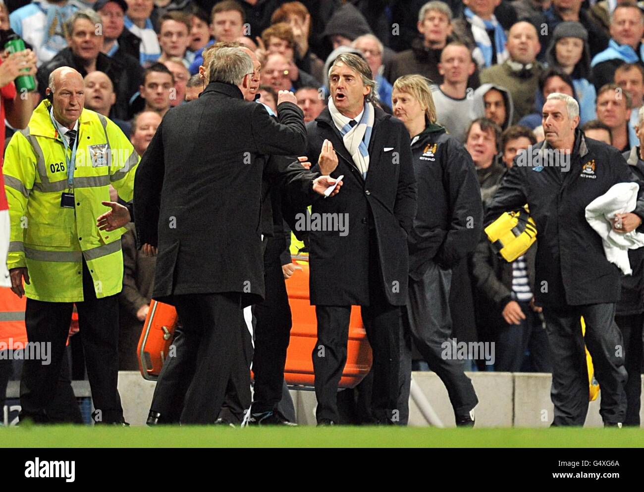 Manchester United's manager Sir Alex Ferguson and Manchester City's ...