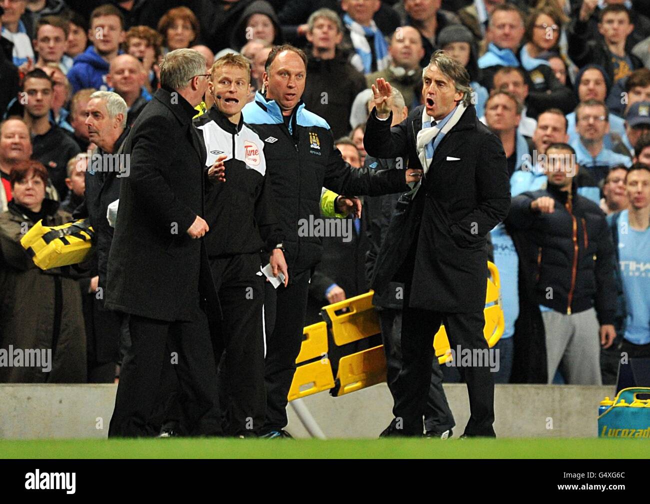 Manchester United's manager Sir Alex Ferguson and Manchester City's ...