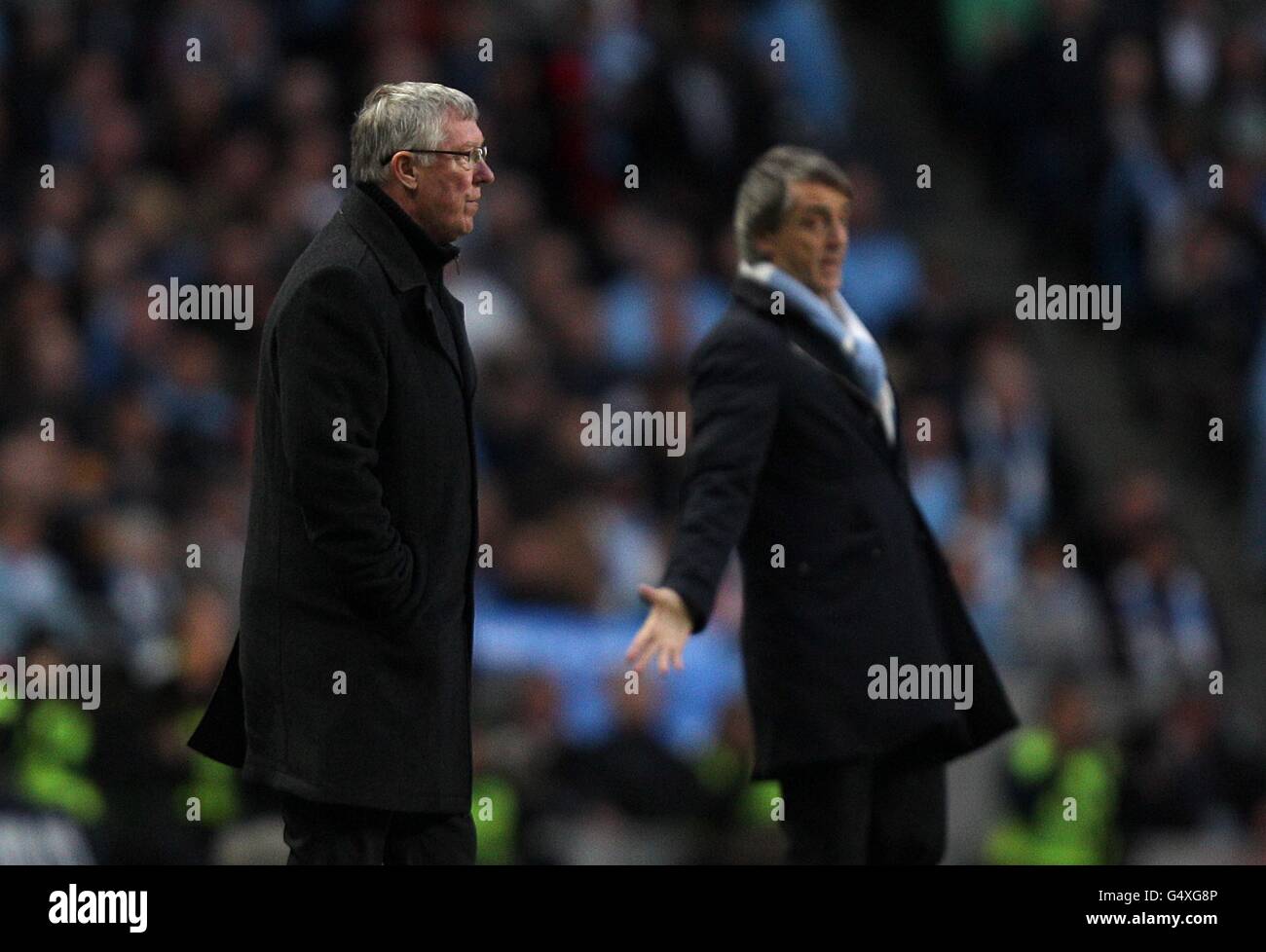 Manchester United's manager Sir Alex Ferguson (left) and Manchester ...