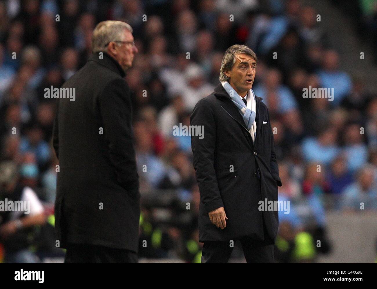 Manchester United's manager Sir Alex Ferguson (left) and Manchester ...