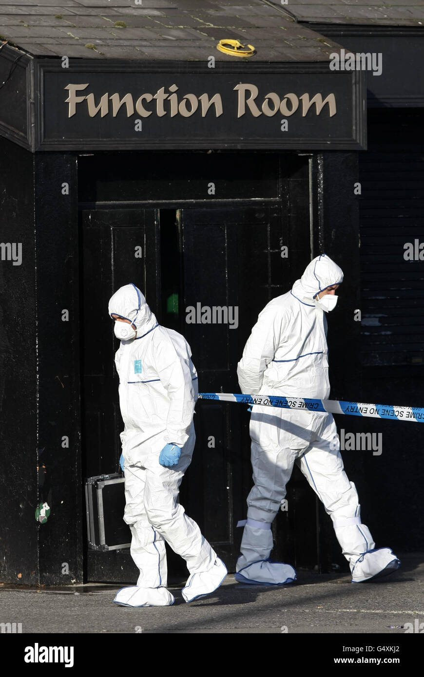 Forensic officers at the scene of the Cappagh Nua pub in the Finglas ...