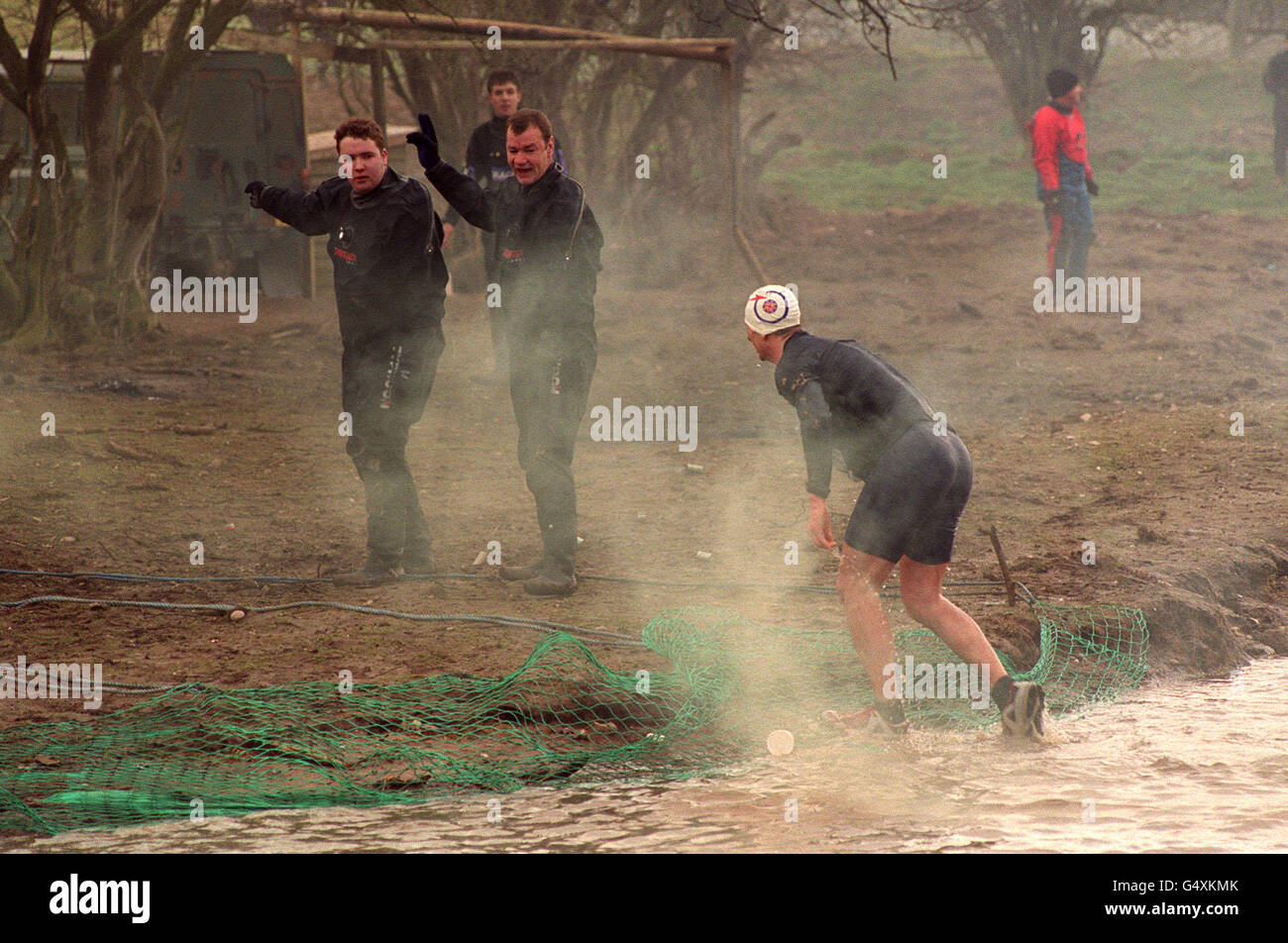 Competitors taking part in the Tough Guy 2000 endurance race for ...