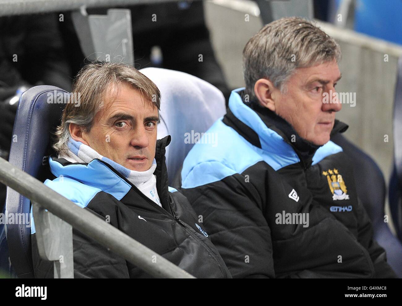 Manchester City manager Roberto Mancini (left) and assistant Brian Kidd ...