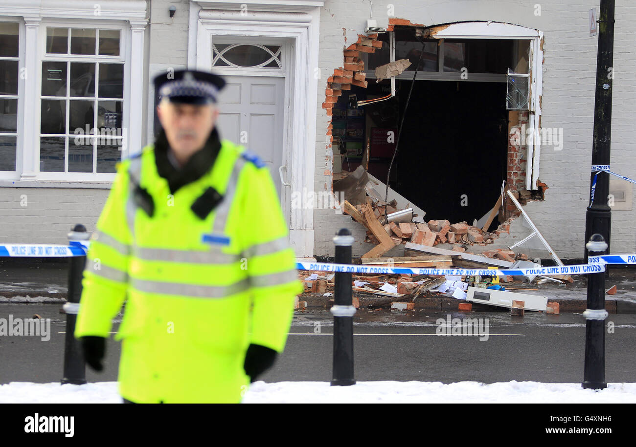 A police officer stands outside a NatWest bank in the small Market Town ...