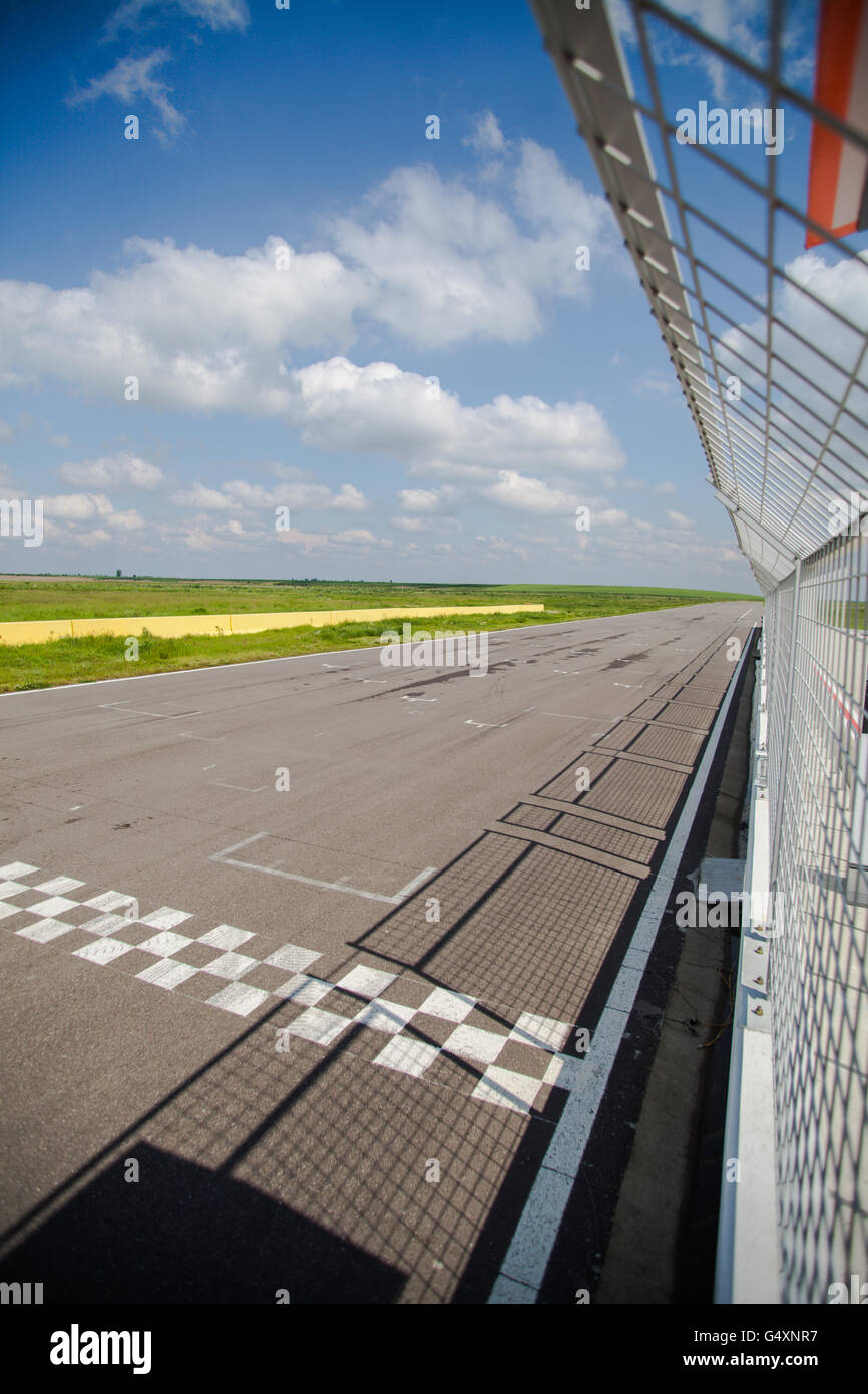 Color image of the finish line of a motor sport circuit Stock Photo - Alamy